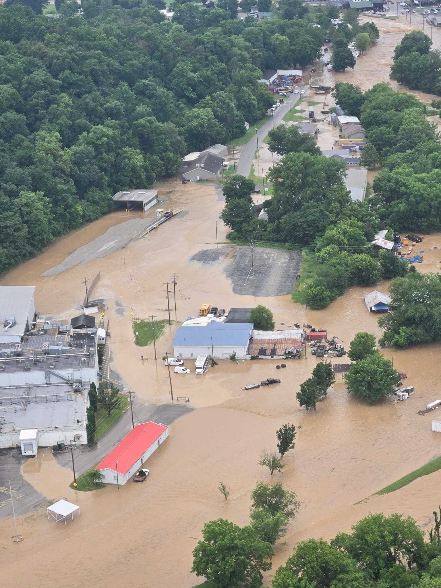 Flash flooding forces evacuations to rooftops in Lanesville, Indiana