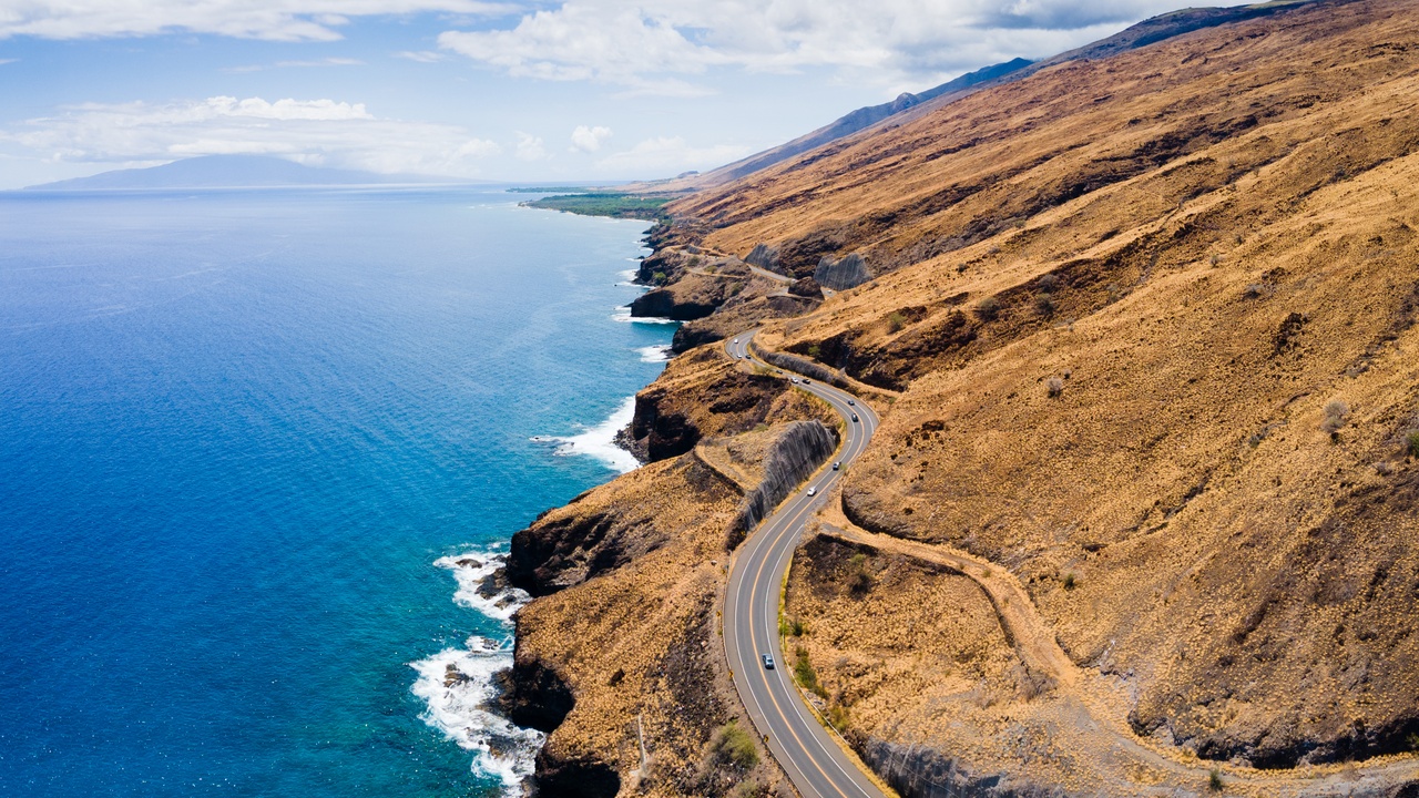One-lane bridges, black sand beaches, and waterfalls you lose count of ...