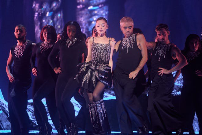 Ariana Grande 'seems very happy' after secret split from Ethan Slater