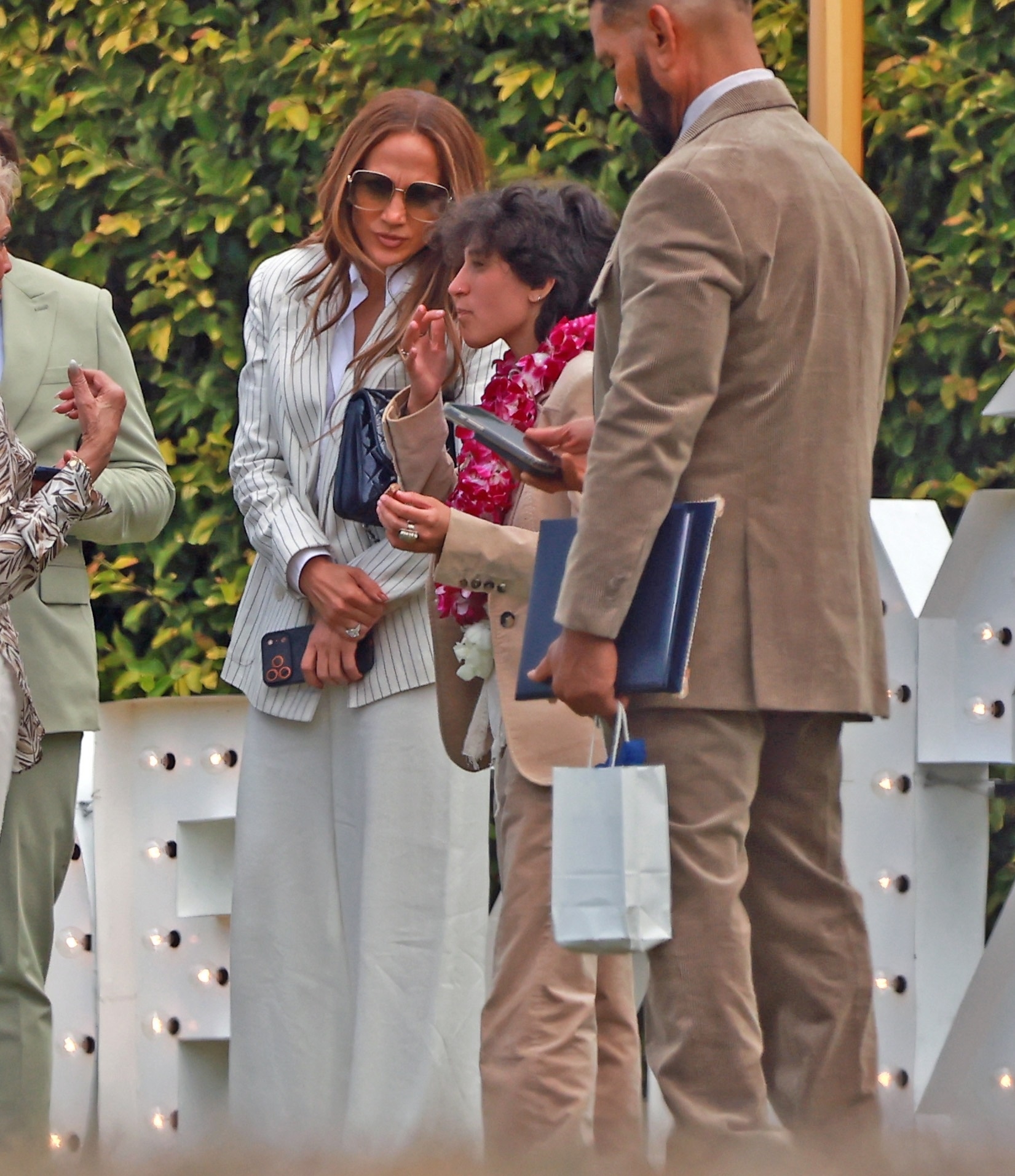 Jennifer Lopez wipes away tears at son Max’s graduation