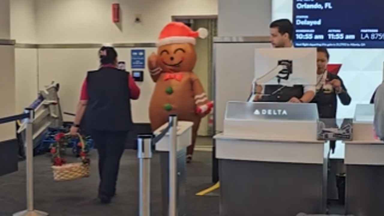 Gingerbread man spreads holiday cheer at the airport