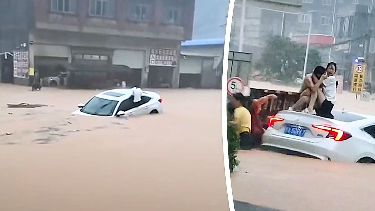 Bystanders brave floodwater to save trapped drivers in China