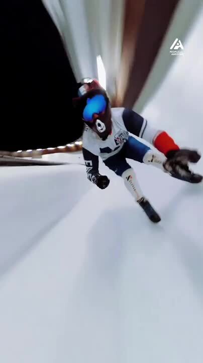 Person skates down bobsled track