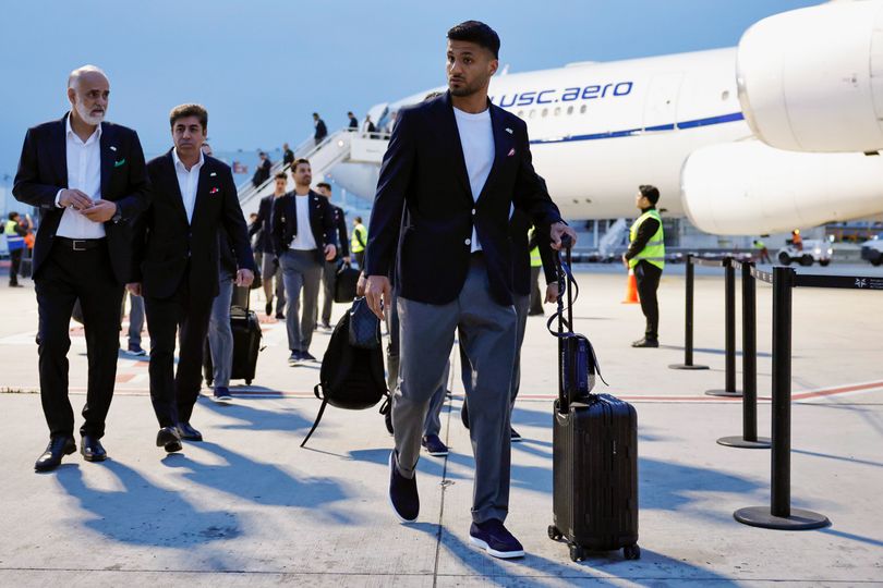 Iranian national team honors school bombing victims upon arrival in ...