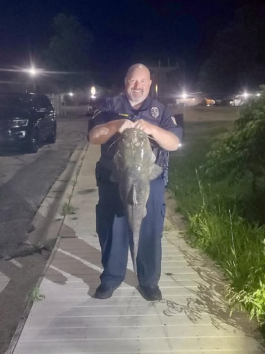 Wisconsin police officer helps catch colossal catfish