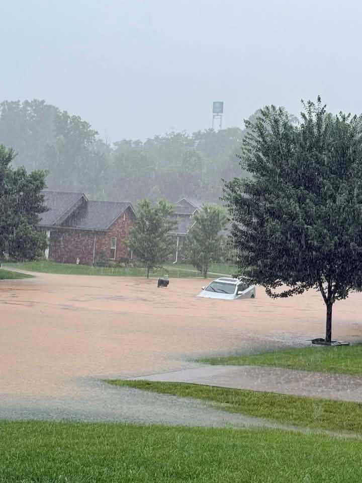 Floodwaters rush into Corydon, closing downtown streets