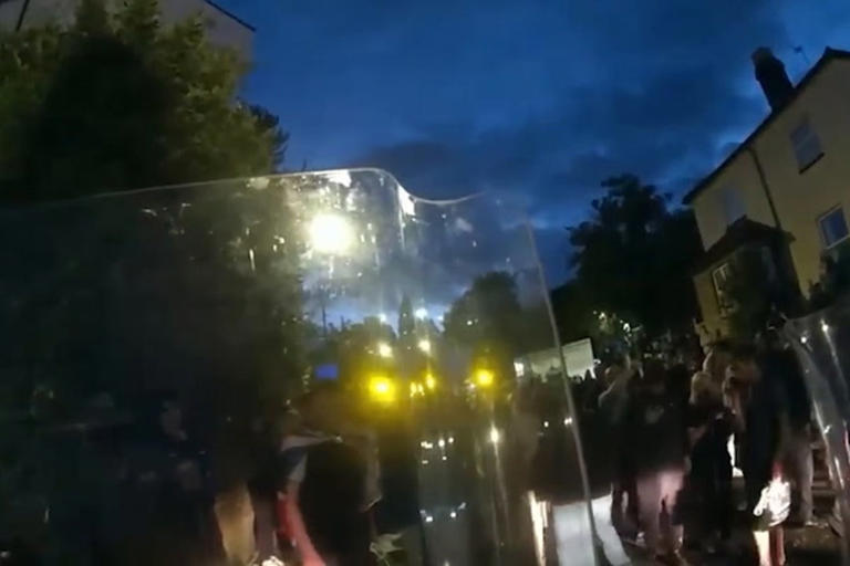 Man seen throwing chairs at police during Henry Nowak protest charged
