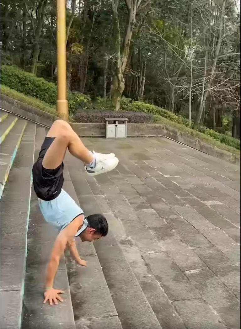 Watch: Man walks on his hands down 100 stairs in 44.71 seconds