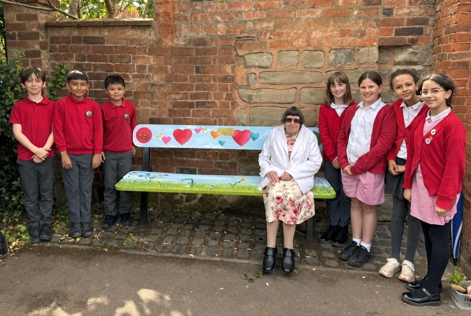 Memorial bench created for much-loved Warwick lollipop man