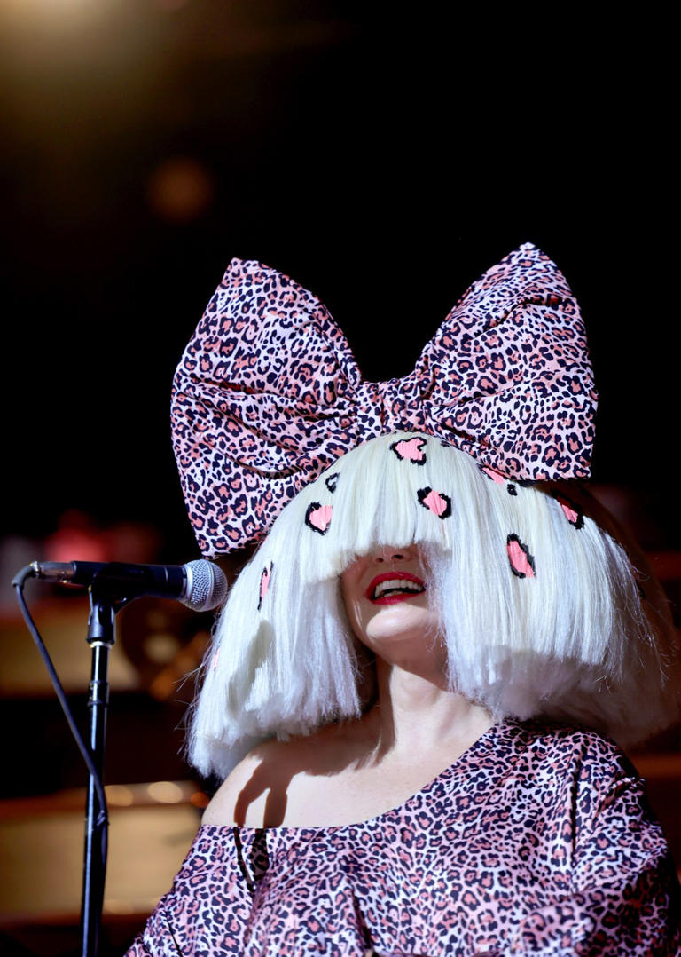 Sia ditches signature disguise for rare barefaced outing in LA