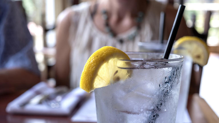 Why restaurants serve water with lemon slices