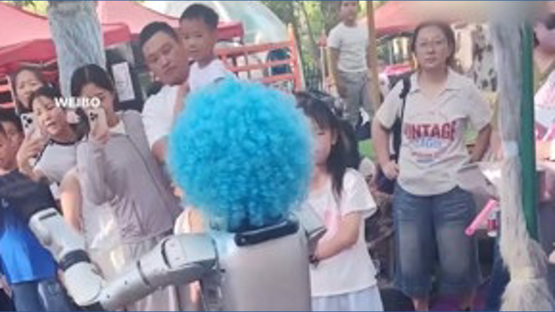 Humanoid robot kids child during performance in China