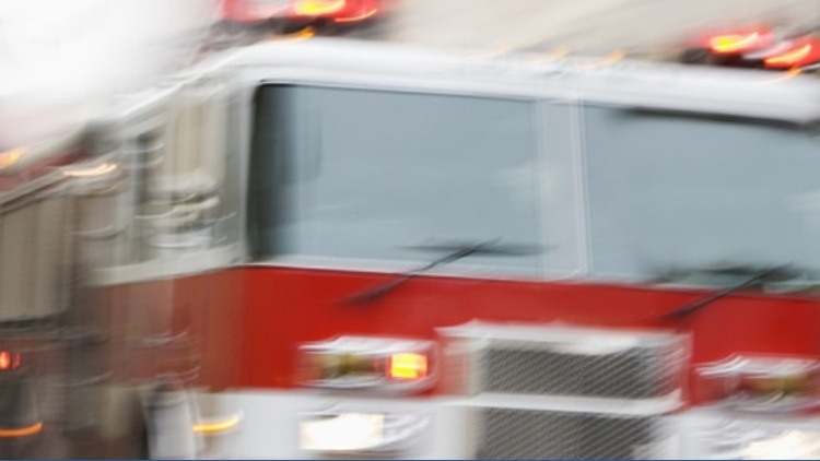 Spokane police sergeant saves elderly woman from house fire