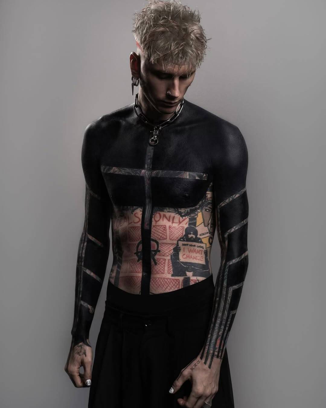Machine Gun Kelly reveals scary side effects after covering body in ...