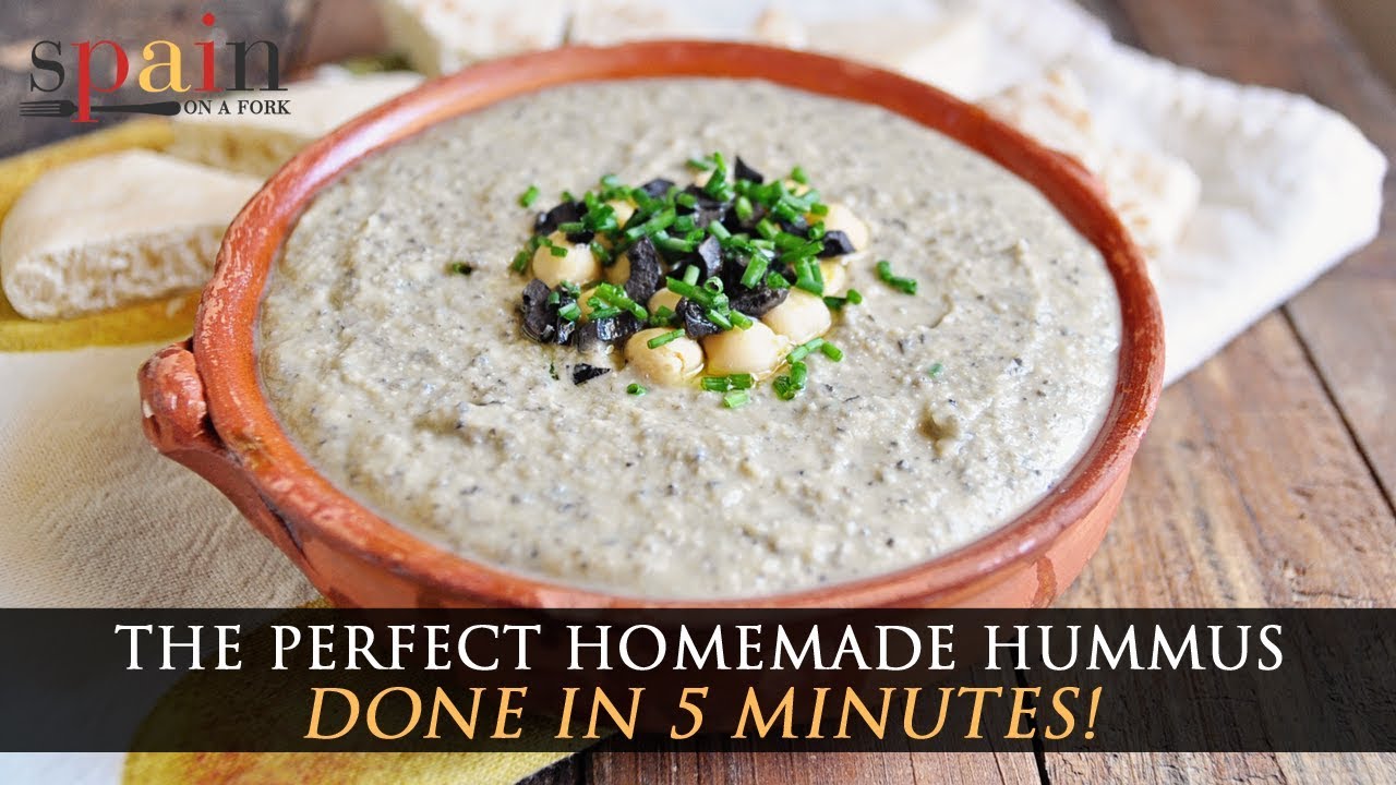 Quick and creamy 5-minute homemade hummus with black Spanish olives