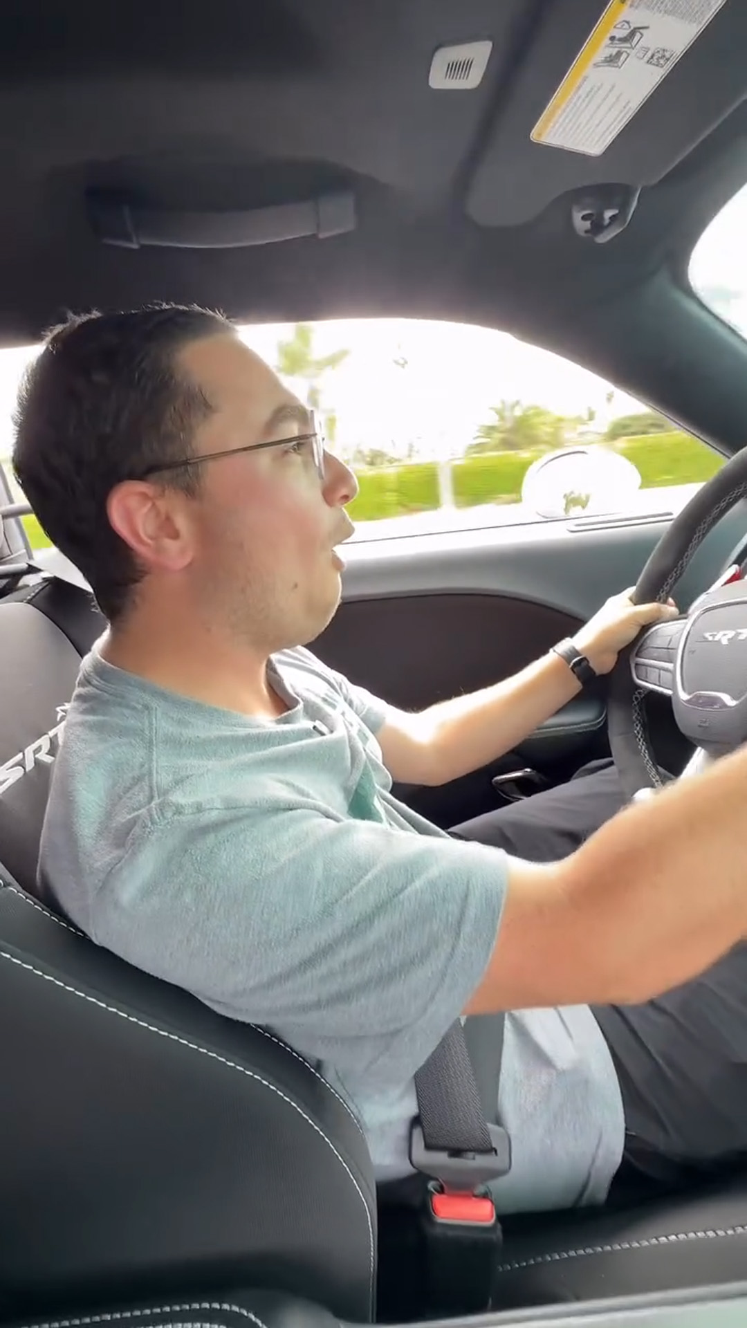 Driving a supercharged Hellcat Redeye with aggressive exhaust roars