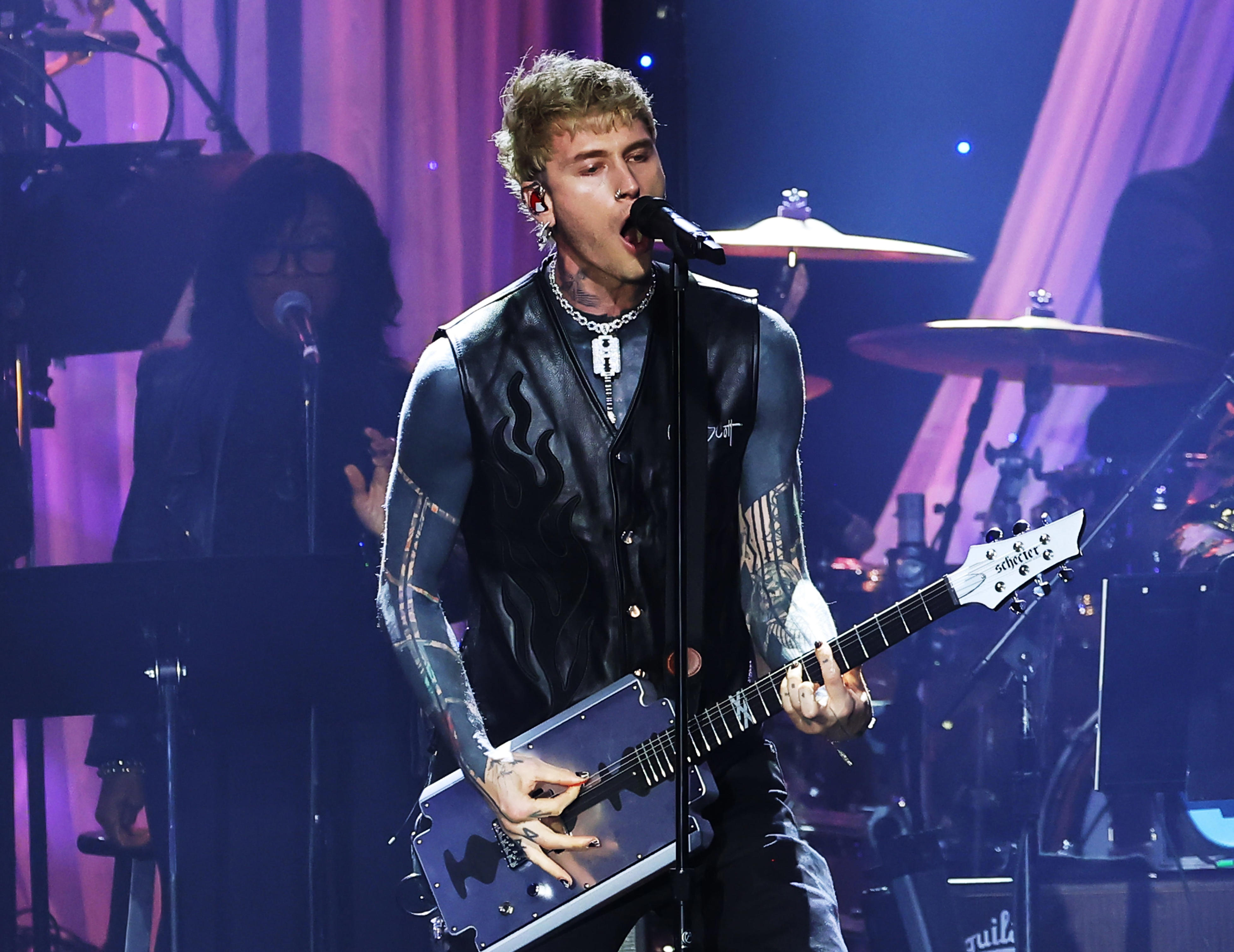 MGK's skin turned yellow after rushing blackout tattoo