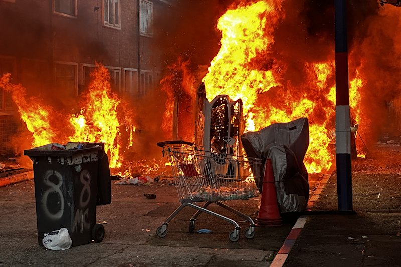 Belfast erupts after police charge man over 'brutal attempted beheading'
