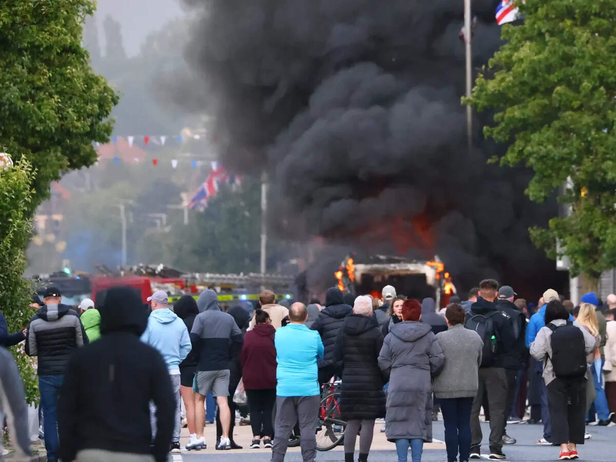 Anti-immigrant protests flare up across Belfast after knife attack
