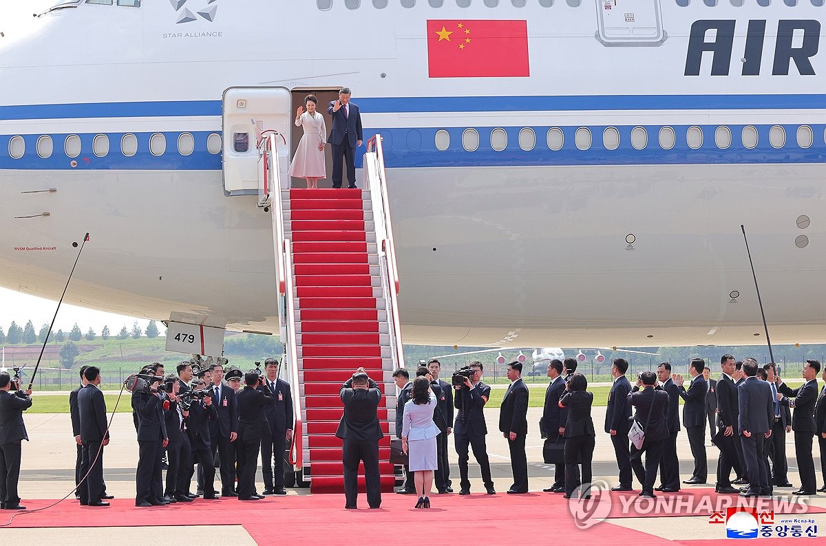 Xi returns home from Pyongyang