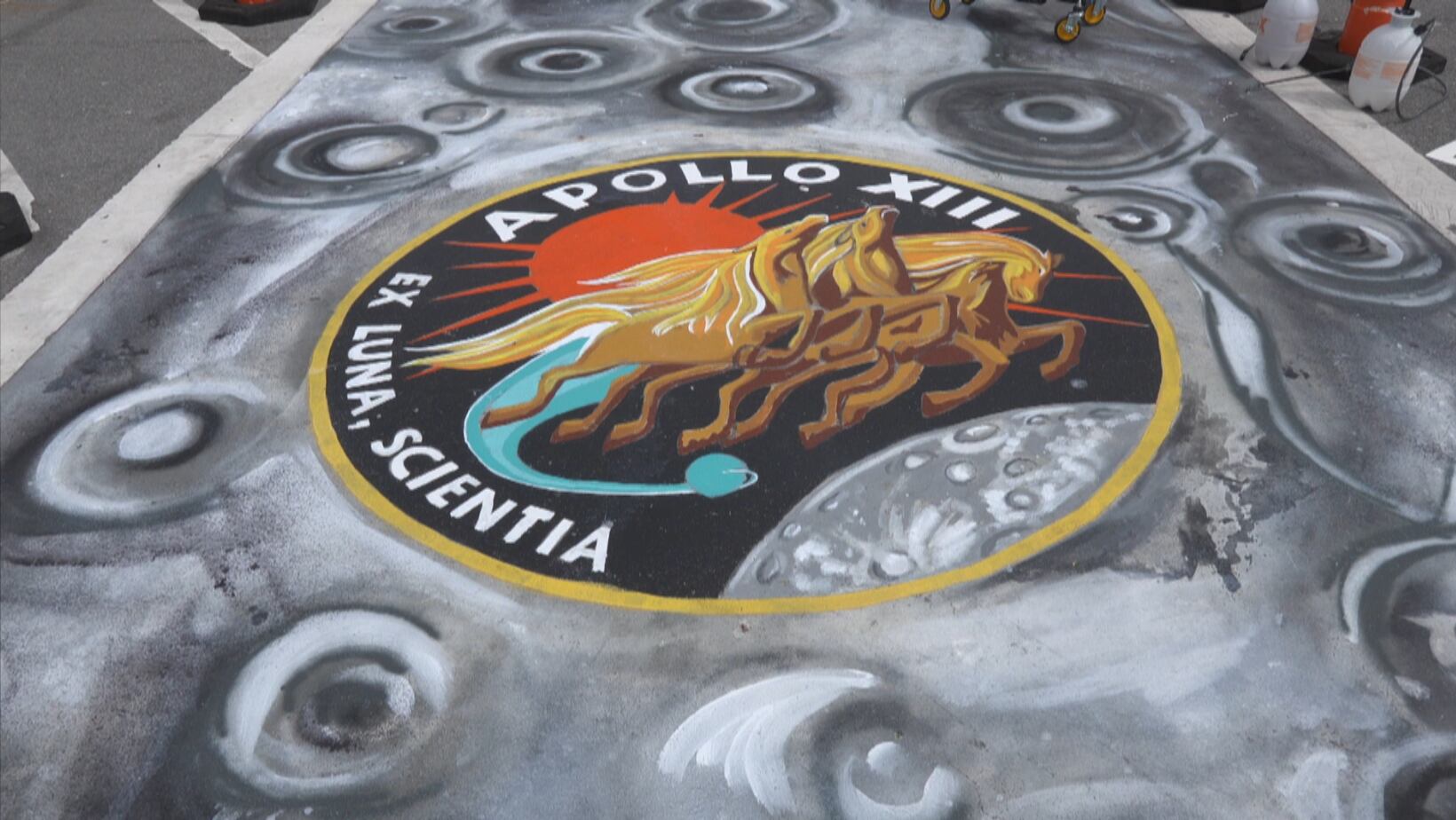 Local artist restores Biloxi moonwalk mural ahead of Fred Haise Landing ...