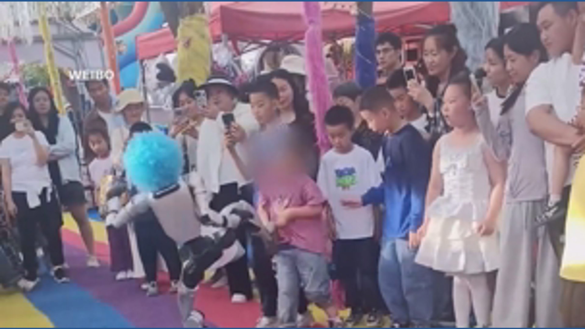Robot kicks boy in stomach
