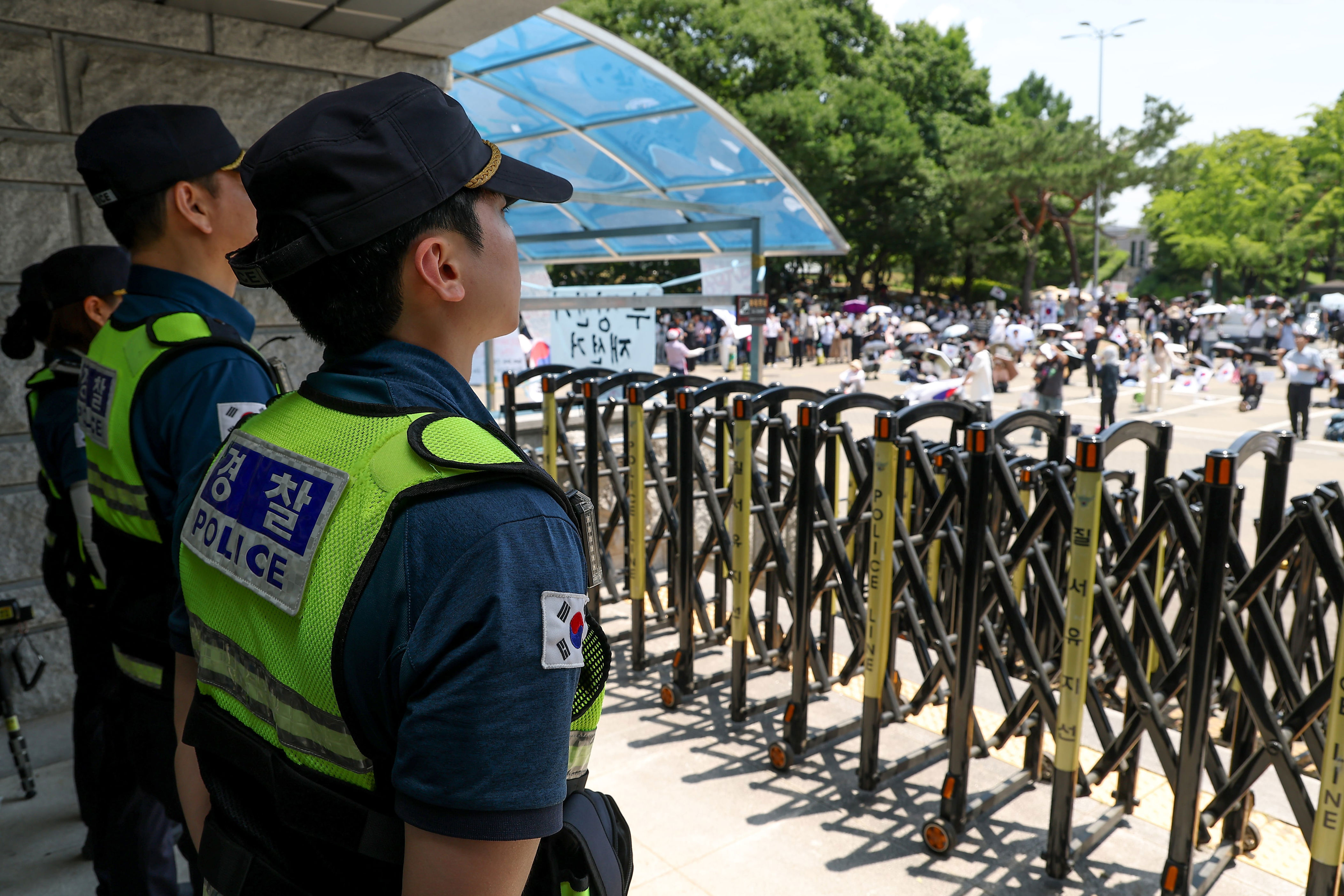 Officer mocked as 'Chinese' demands police authority restoration
