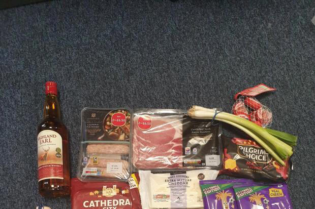 Suspected shoplifters charged after being caught with alcohol bottles