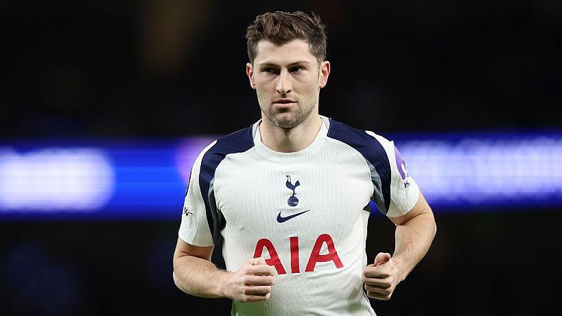 Spurs defender Davies signs new one-year deal