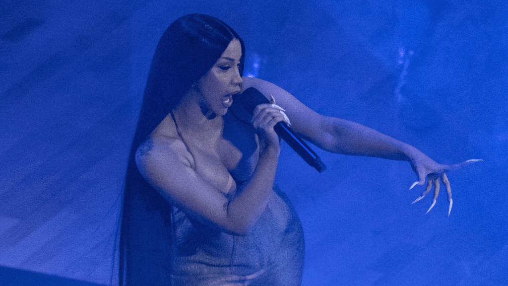Cardi B gives plunging latex top hanging by a string a Chanel upgrade