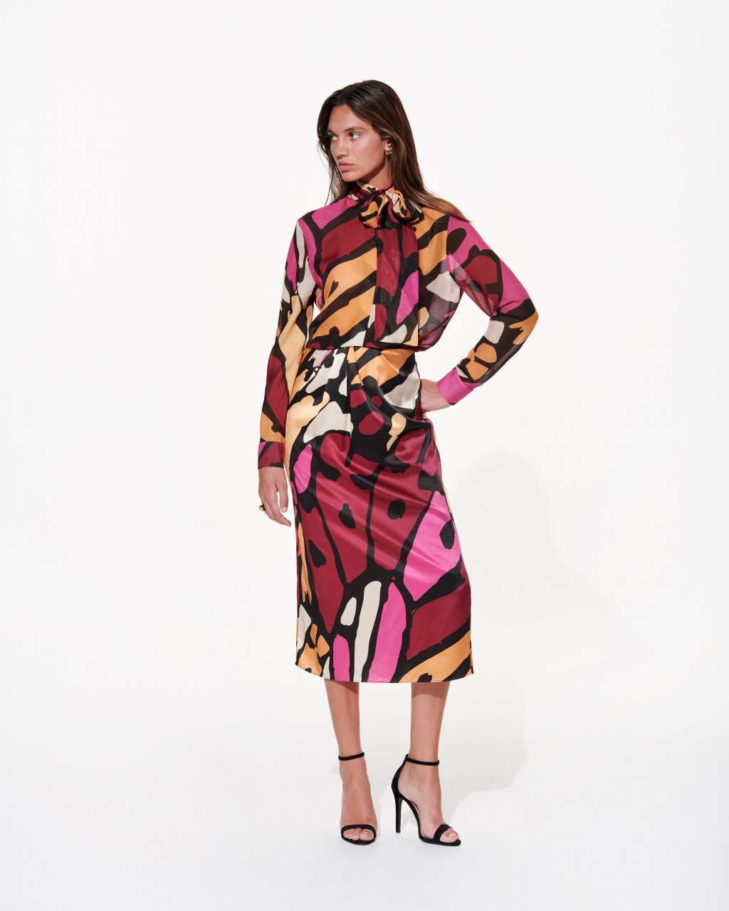 Issa makes a comeback with prints, silky draped dresses