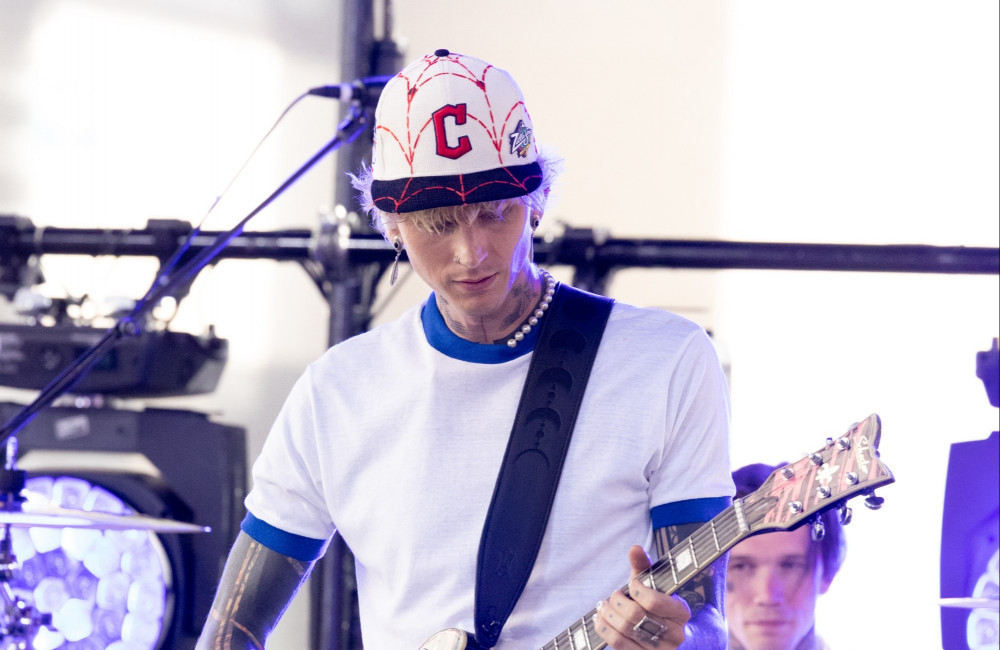 Machine Gun Kelly 'turned yellow' having blackout tattoo