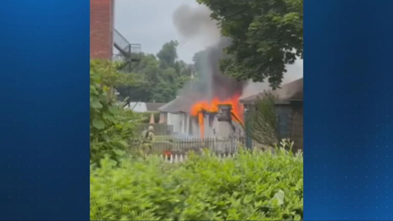 Multiple garages catch fire in Forest Hills