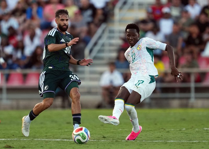Soccer-Saudi Arabia and Senegal end scoreless in final World Cup friendly