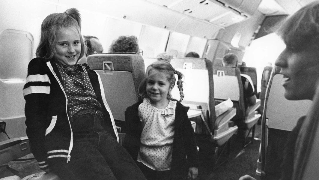 Preventing and handling kids kicking airplane seats
