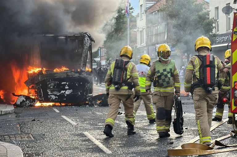 Bus torched as anti-immigration protests erupt after stabbing attack in ...