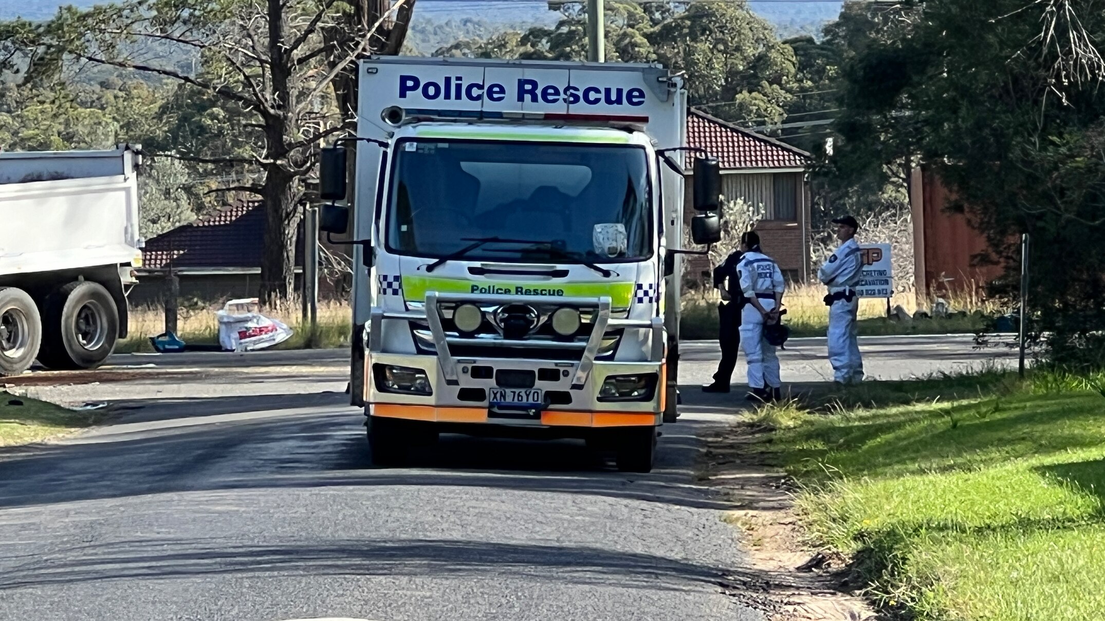 Two killed as two trucks and a car collide south of Nowra, driver ...