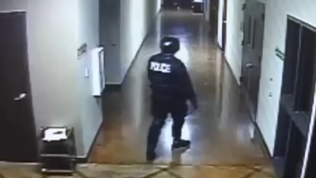 When a figure in tactical gear entered “a place that’s supposed to be ...