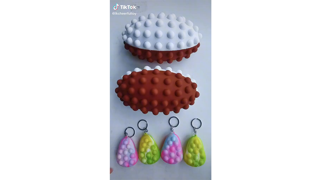 Playing with giant bubble texture balls and mini pop it keychains