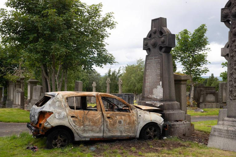 Car smashed into gravestone and torched at Glasgow cemetery leaving ...