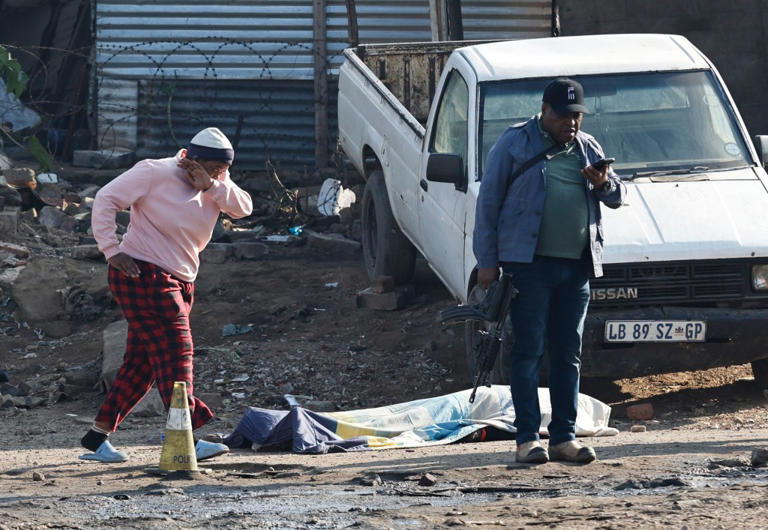 Multiple attackers kill 12 people and wound 9 in a late-night mass ...