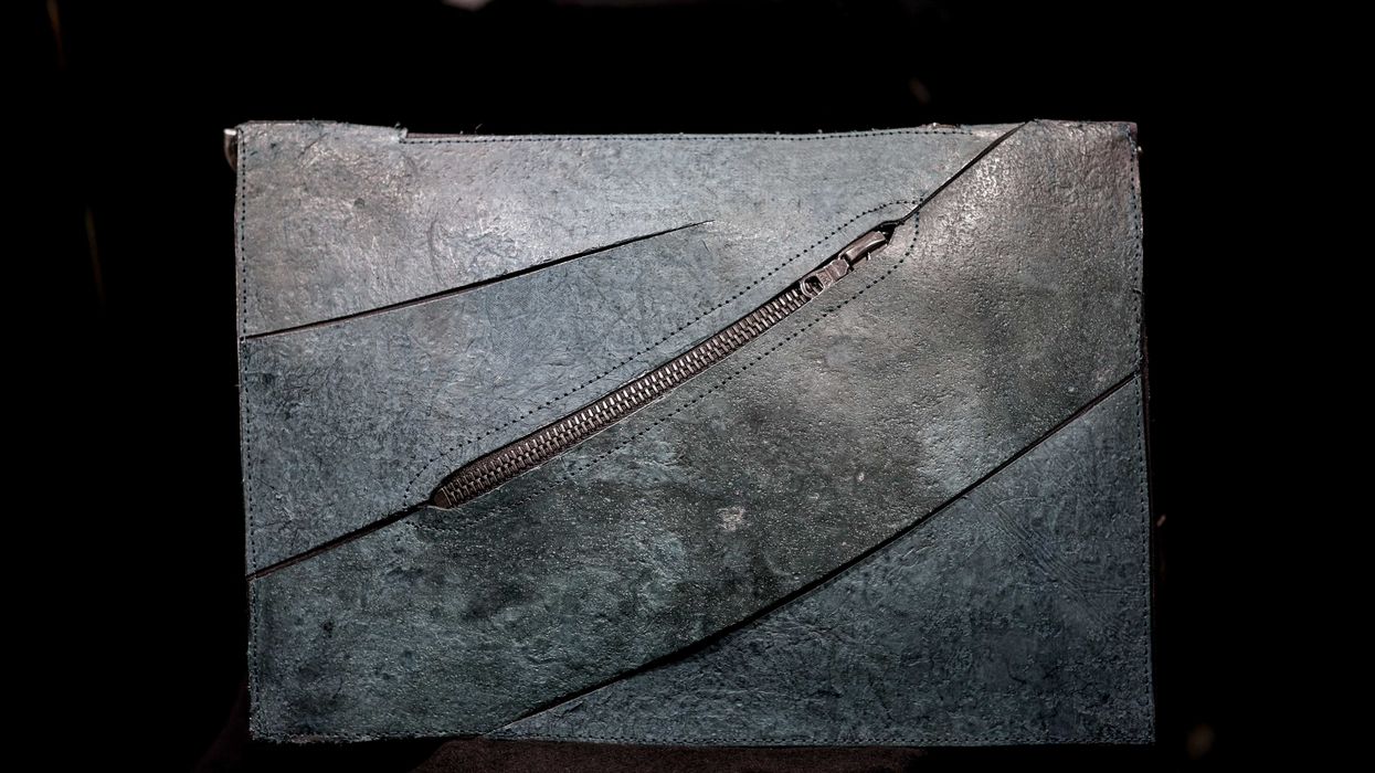Is this the world's oldest bag? 'T-Rex' leather clutch is about to go ...
