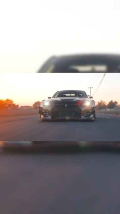 Sunset road run with a black supercar