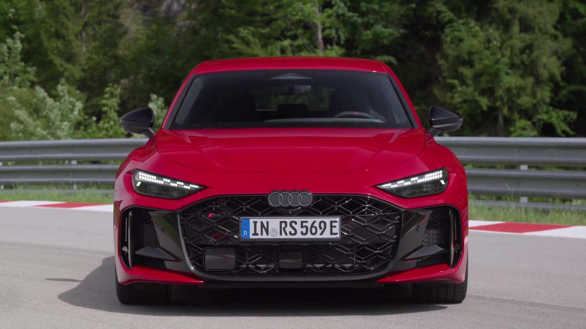 The new Audi RS 5 sedan exterior design in Progressive Red