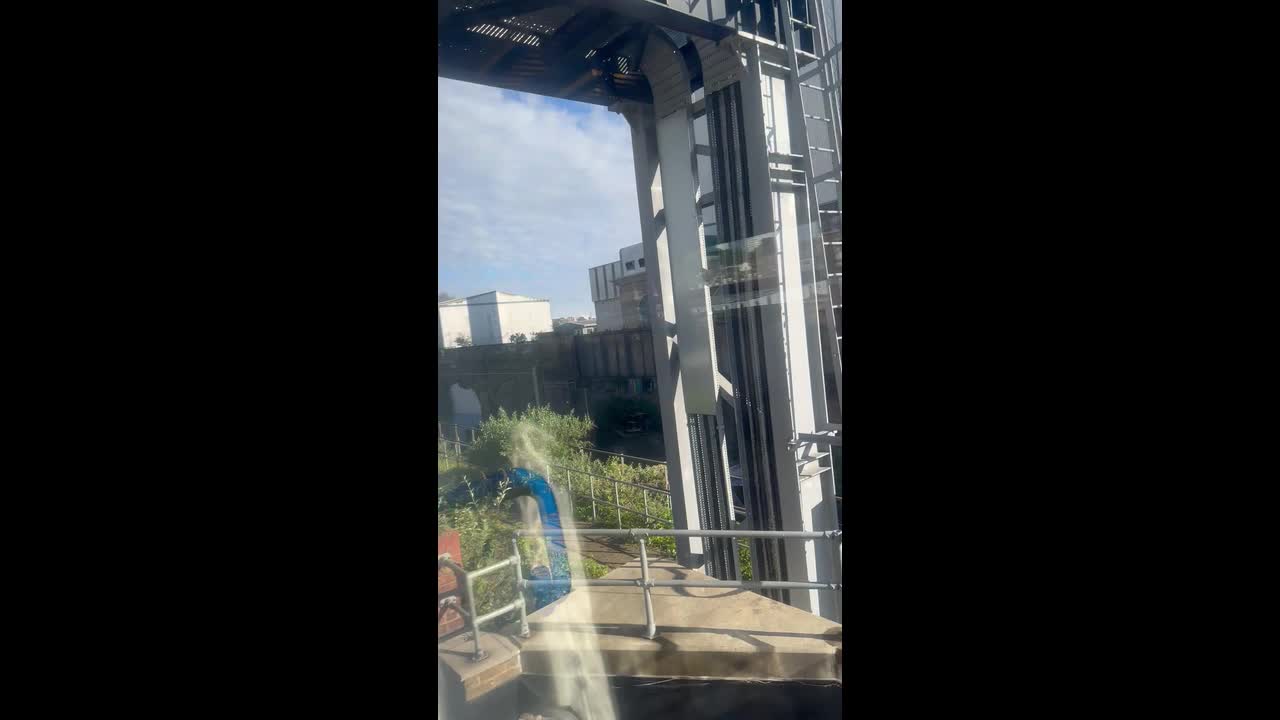 Passenger films as train passes huge fire at London recycling plant