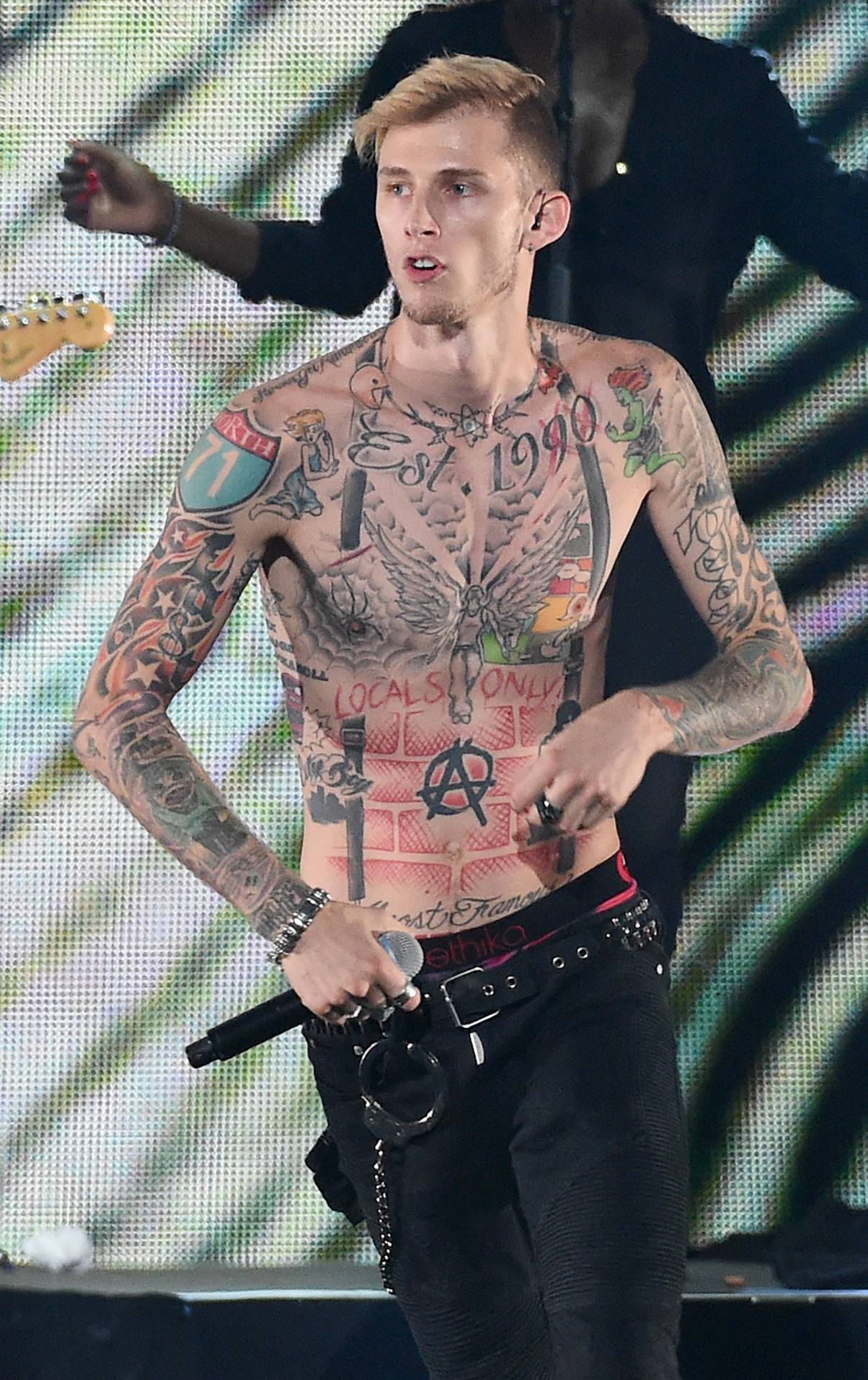 Machine Gun Kelly reveals scary side effects after covering body in ...