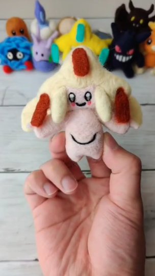 Shiny Pokemon wool art with vibrant details
