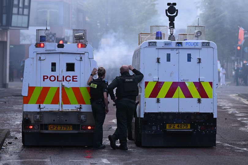 UK's night of rage as masked gangs set streets on fire and cops flee in ...