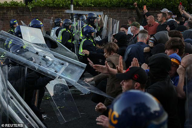 One in three Britons believe police treat ethnic minorities more ...