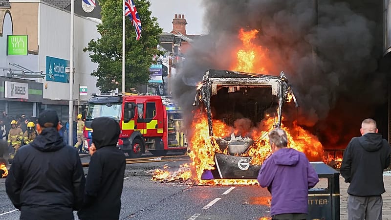 Two officers injured as anti-immigration protests break out in Belfast ...
